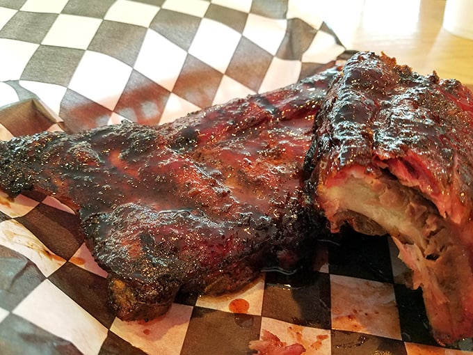 Behold the holy grail of barbecue – ribs so tender they practically surrender before you take a bite.