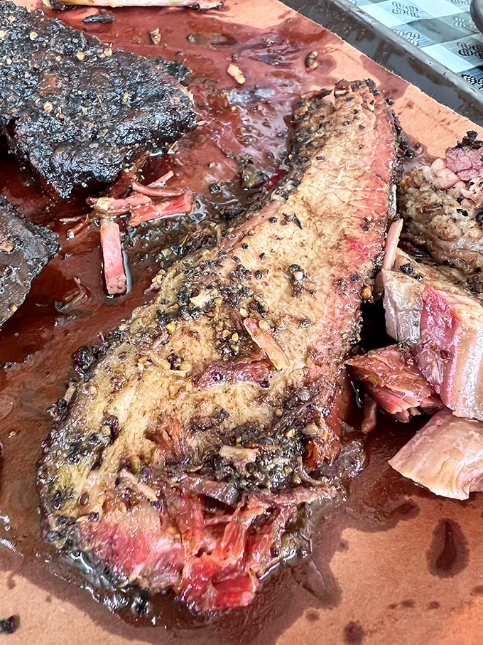 Behold the brisket in all its glory – that bark, that smoke ring, that juicy tenderness. This isn't just meat; it's a religious experience.