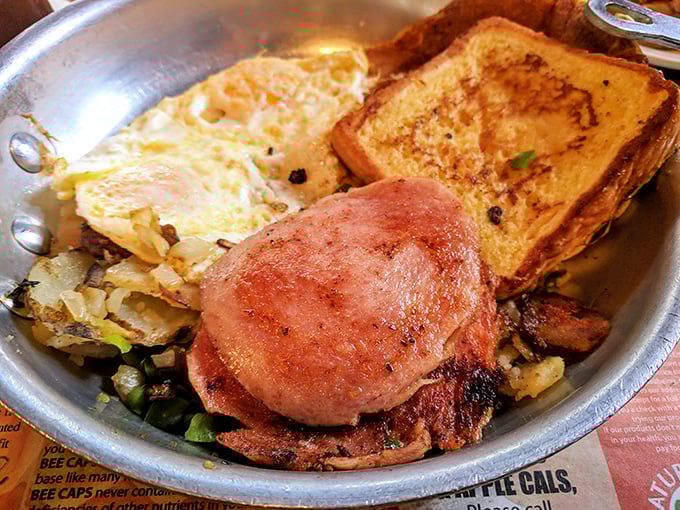 Behold the star of the show—hickory-smoked brisket with golden home fries and toast. This is what food dreams are made of.
