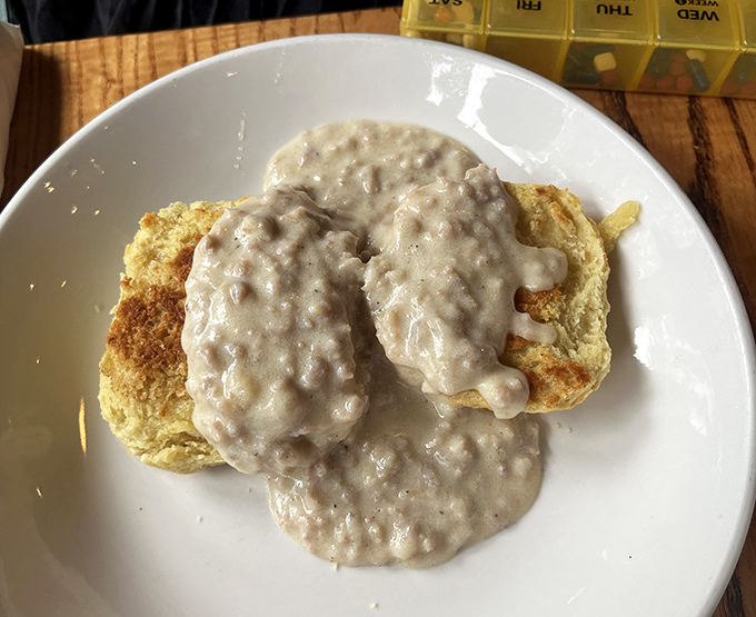 Behold: biscuits swimming in sausage gravy like they've found their soulmate. Comfort food that hugs you from the inside out.