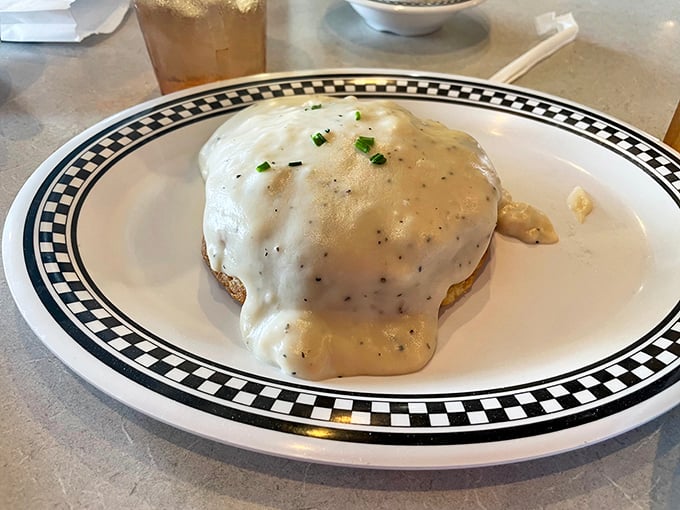 This is what happens when biscuits and gravy achieve their final form – pure Southern comfort on a plate.
