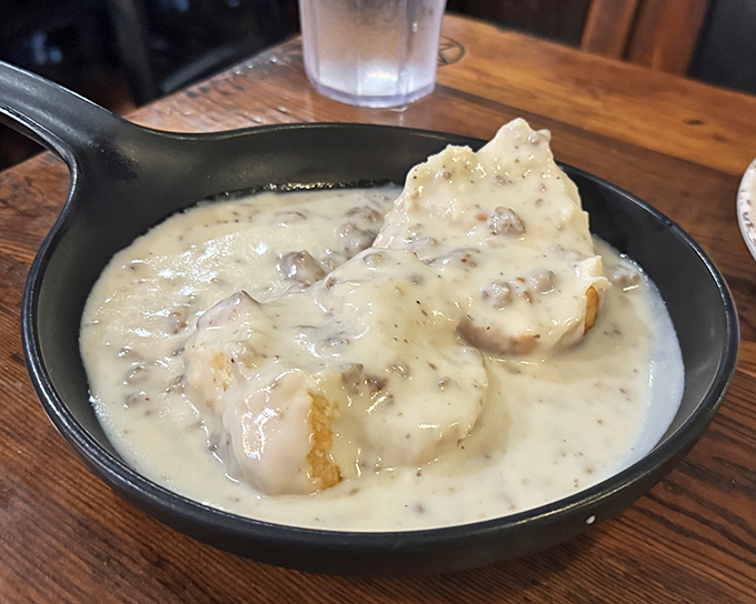 Biscuits swimming in creamy, pepper-flecked gravy—a simple pleasure that somehow feels both sinful and spiritually necessary.