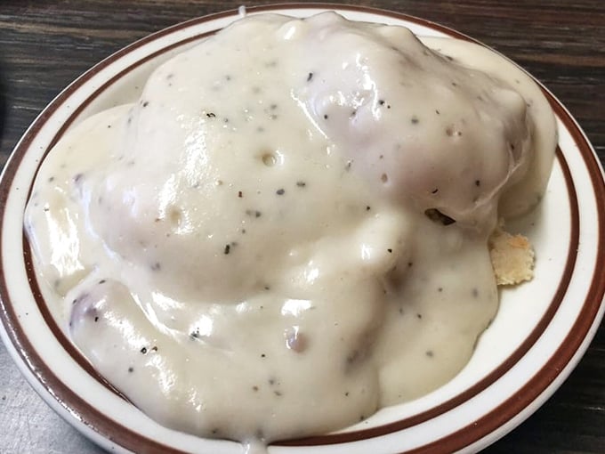 Behold the legendary biscuits and gravy—a peppery, sausage-studded masterpiece that's converted more vegetarians than a bacon shortage.