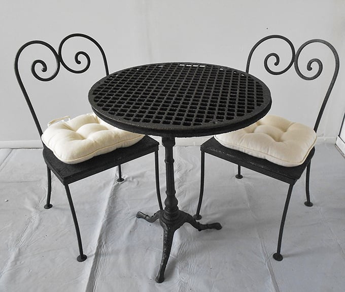 This isn't just a bistro set—it's the perfect spot for your morning coffee and crossword ritual. Scrollwork that would make Parisian cafés jealous.