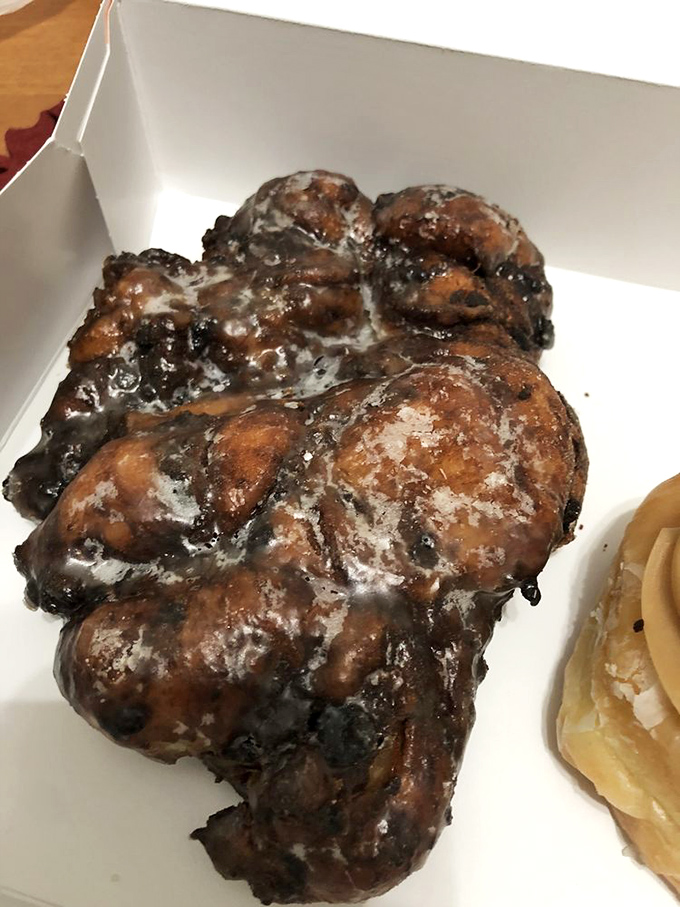 The infamous Blueberry Fritter – a masterpiece of crispy exterior and jammy interior that should come with its own warning label.