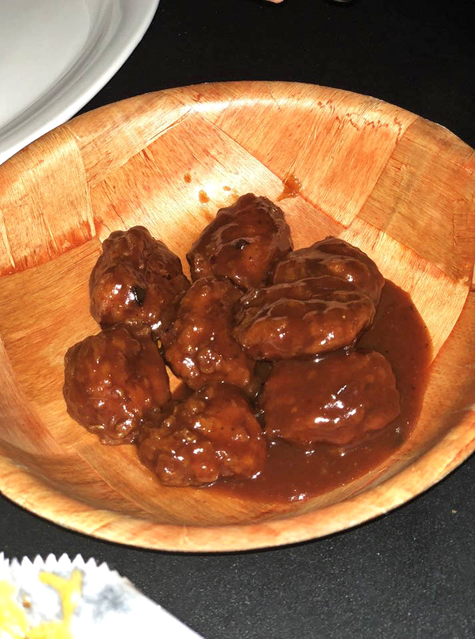 These boneless wings aren't just good, they're life-changing—glistening with sauce that strikes the perfect balance between sweet and heat.