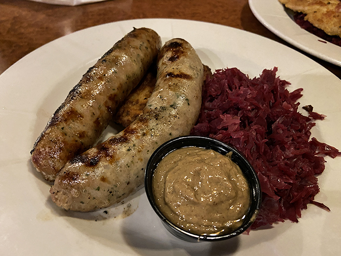 These house-made sausages aren't just bratwurst—they're time machines to a German beer garden, complete with tangy sauerkraut and mustard that means business.