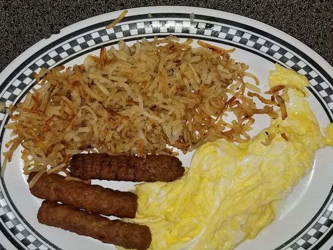 Breakfast perfection doesn't need to be complicated: crispy hash browns, sausage links, and eggs that actually look like eggs should.