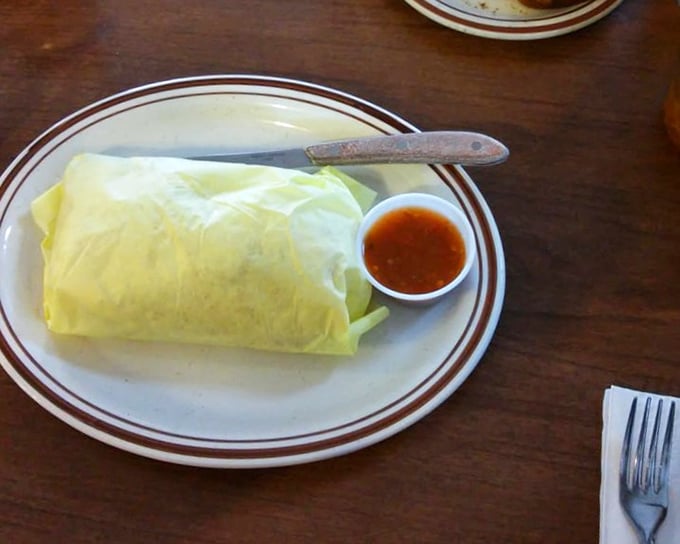 Breakfast burritos at Teddy's don't need fancy wrapping—just a perfect yellow envelope of eggs stuffed with goodness and a side of salsa for dipping.