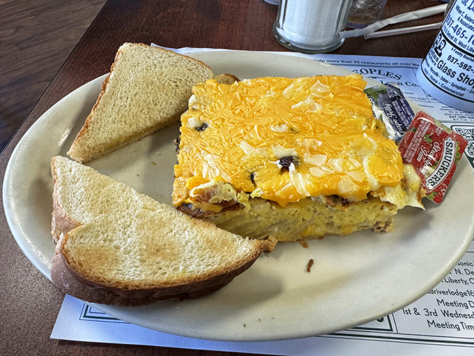 Breakfast casserole that puts your aunt's holiday morning specialty to shame. That golden cheese crust should have its own fan club.