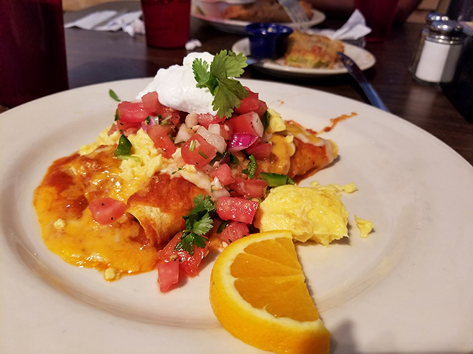 Breakfast enchiladas that make you question why you ever settled for cereal—vibrant, saucy, and topped with enough fresh pico to wake up your taste buds.