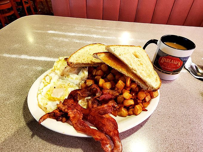 Breakfast perfection doesn't need fancy plating—just perfectly crispy home fries, eggs that know their purpose, and toast standing at attention.