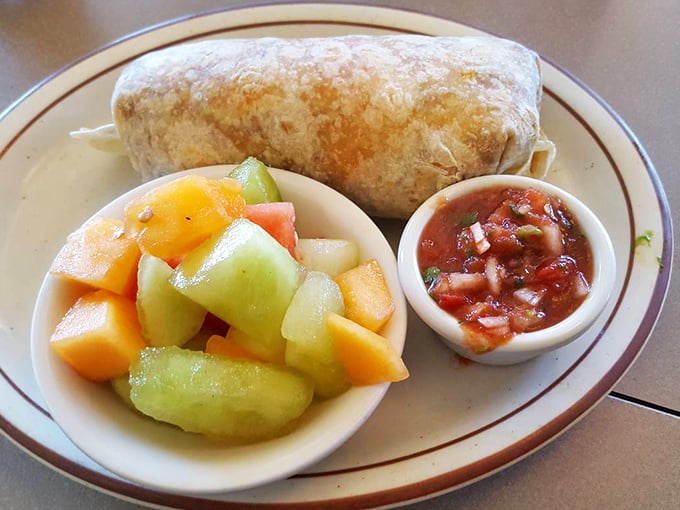 The legendary breakfast burrito arrives with fresh fruit and house salsa. A perfect harmony of eggs, cheese, and morning happiness.