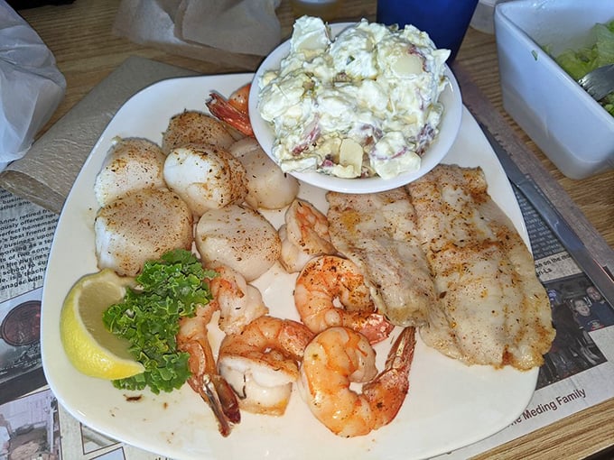 The seafood combo platter – where scallops, shrimp, and stuffed flounder gather like old friends for a delicious reunion on your plate.