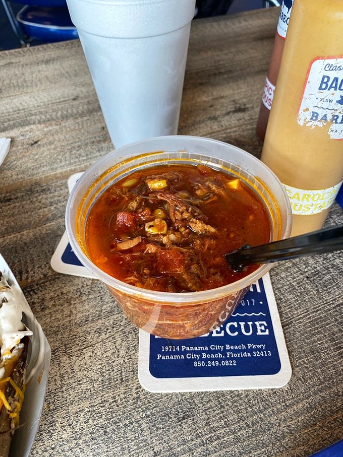 Brunswick stew that looks like it could tell stories—chunks of smoky meat swimming in a tomato broth that's been simmering since breakfast.