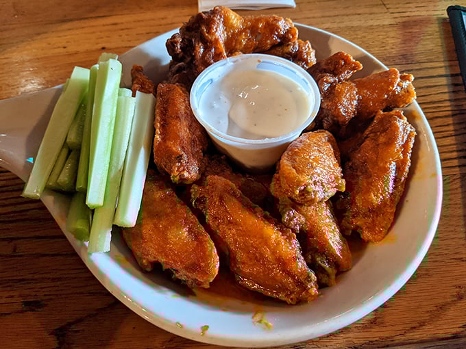 These buffalo wings aren't just a meal; they're a declaration that bar food can transcend expectations when done with proper respect.
