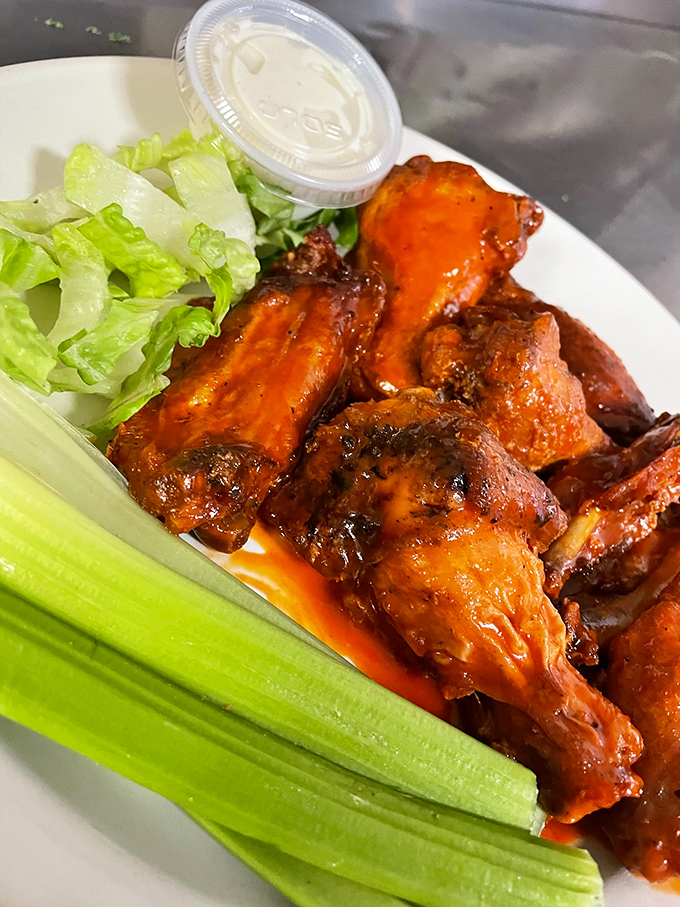 These buffalo wings aren't messing around. Crispy, saucy, and unapologetically messy—exactly how comfort food should be. Napkins required, not optional.