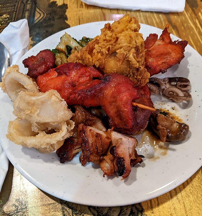 A plate that tells the story of buffet strategy – a little of this, a bit of that, and absolutely no regrets.