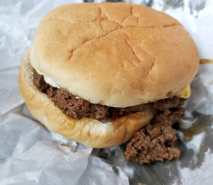 The legendary Zip Burger in all its loose-meat glory. Like a Sloppy Joe that went to finishing school but kept its wild spirit.