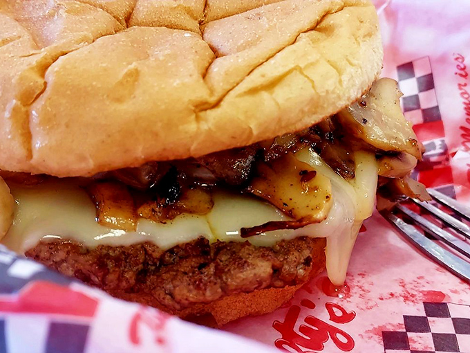 Not all heroes wear capes—some come on a bun with melted cheese cascading down the sides like a dairy waterfall of dreams.