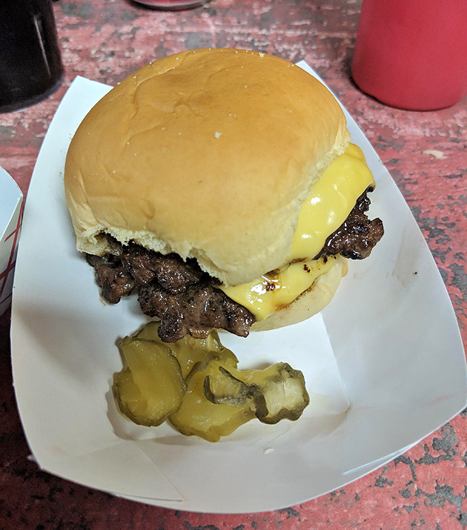 Behold the cheeseburger's Cuban cousin – juicy, seasoned beef topped with melty cheese that makes first-timers wonder where it's been all their lives.