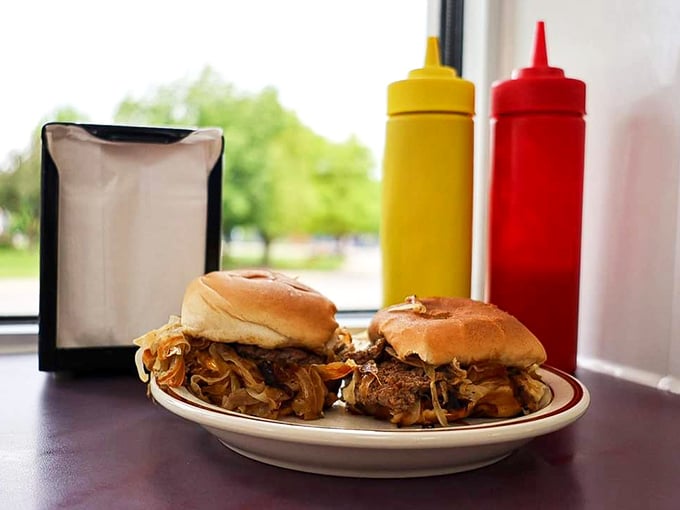 These aren't just burgers—they're edible history. The caramelized onions practically melt into the patty, creating a symphony of flavors that would make Mozart weep.