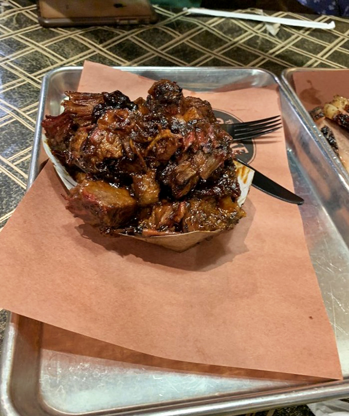 Burnt ends – BBQ's holy grail. These glistening morsels of brisket have been kissed by smoke so long they've practically gotten engaged to it. 