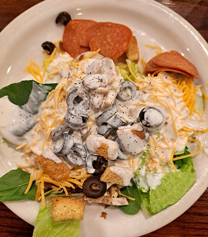 This isn't just any Caesar salad—it's a masterpiece of creamy indulgence where olives, cheese, and pepperoni conspire to make you forget you're technically eating vegetables.
