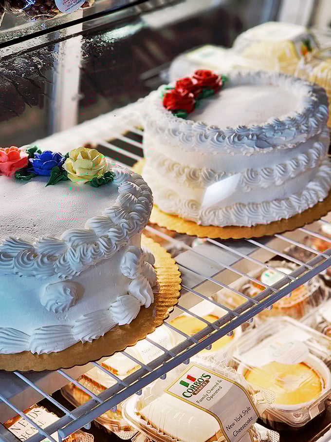 These wedding cakes aren't just desserts—they're edible architecture. The delicate sugar flowers and perfect piping would make even the most stoic Italian grandmother weep with joy.