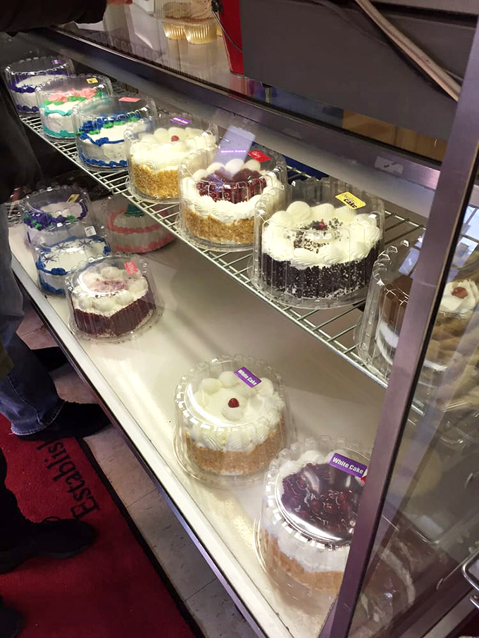 These cakes sit pretty in their cases, each one a masterpiece that would make Julia Child weep with joy.