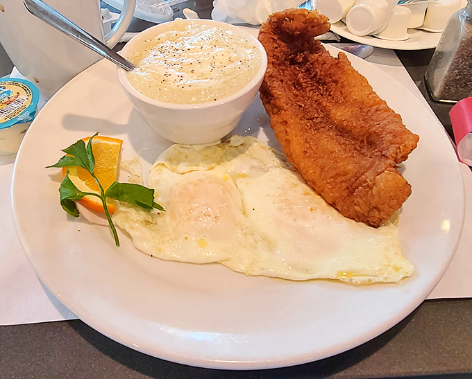 Breakfast perfection doesn't exi— Oh wait, it does! Golden catfish alongside eggs so perfectly cooked they deserve their own Instagram account.