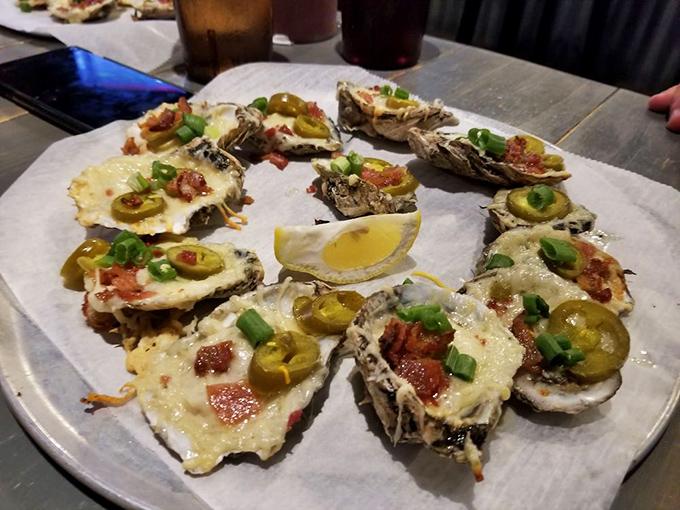 These chargrilled oysters aren't just food – they're little buttery, garlicky miracles on the half shell.