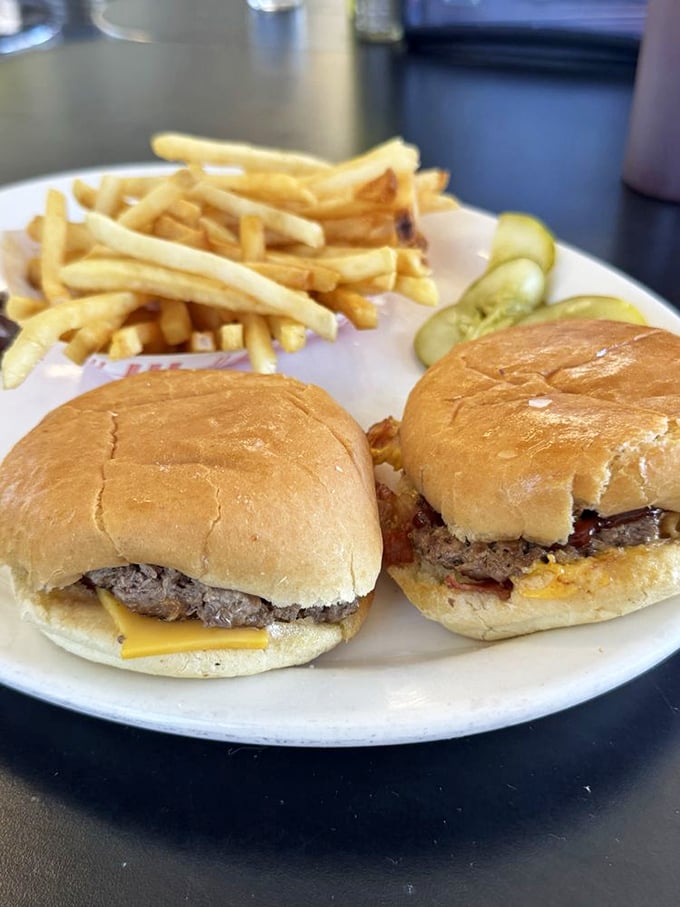 These aren't just sliders; they're edible history lessons. The perfectly proportioned burgers with their caramelized edges tell stories of American culinary tradition.