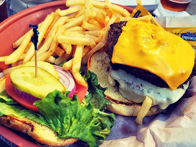 This isn't just a cheeseburger – it's a masterpiece of melty cheese, fresh veggies, and beef that makes you question why you ever ate anything else.