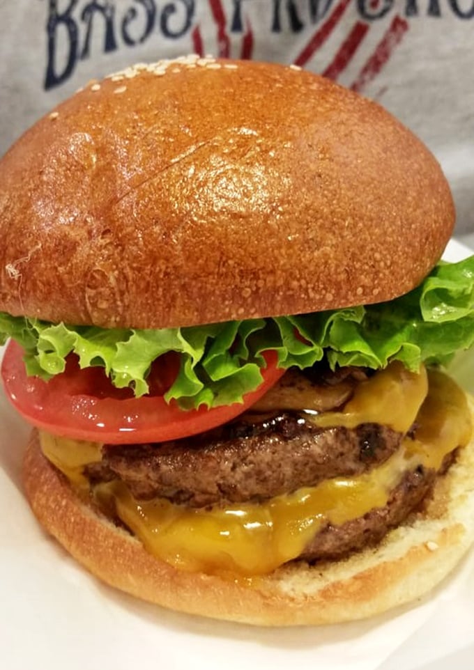 This isn't just a cheeseburger—it's edible architecture where each layer plays its part in a symphony of savory perfection.