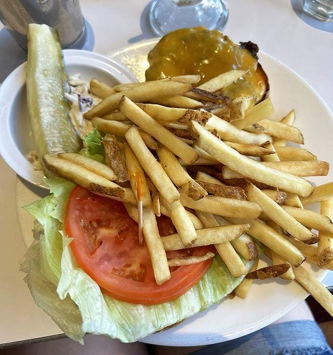 This isn't just a burger—it's edible nostalgia, where every bite comes with a side of perfectly golden fries and zero regrets.