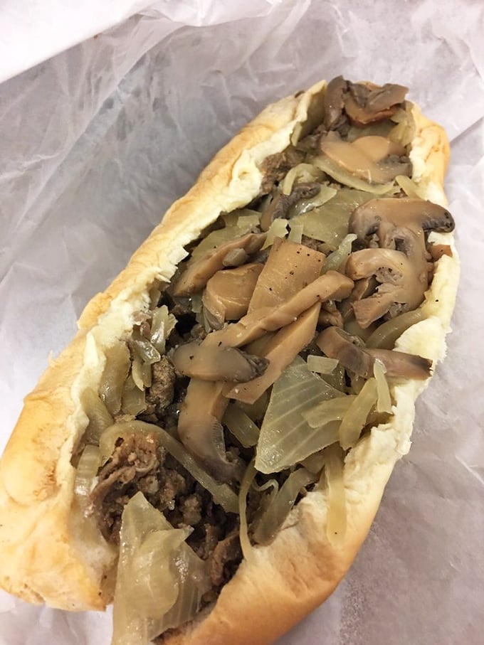 Mushrooms, onions, and beef living their best lives together. This cheesesteak isn't just a sandwich—it's a beautiful relationship.