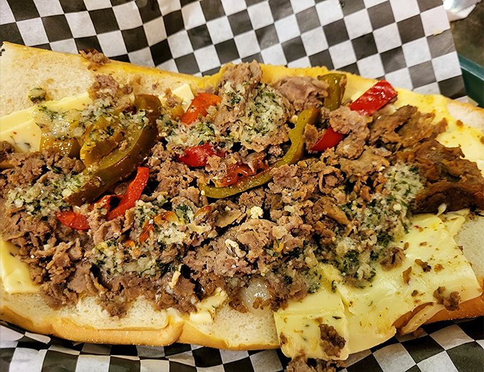 Behold the holy grail of rural Pennsylvania—chopped steak mingling with peppers and cheese on a perfect roll. This isn't food; it's edible poetry.