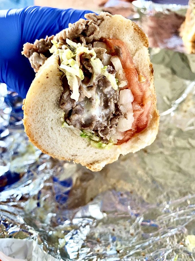 The holy grail of cheesesteaks – perfectly seasoned meat, melty cheese, and fresh toppings all embraced by a roll that deserves its own fan club.