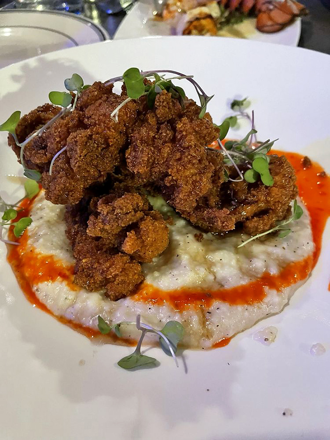 The legendary Chicken Fried Lobster—where Southern comfort meets oceanic luxury. It's what would happen if Paula Deen and Neptune collaborated.