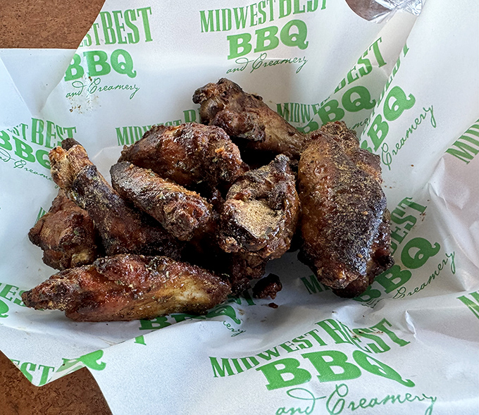 These aren't just wings; they're a masterclass in texture—smoky, crispy exterior giving way to juicy meat that makes you forget napkins exist.