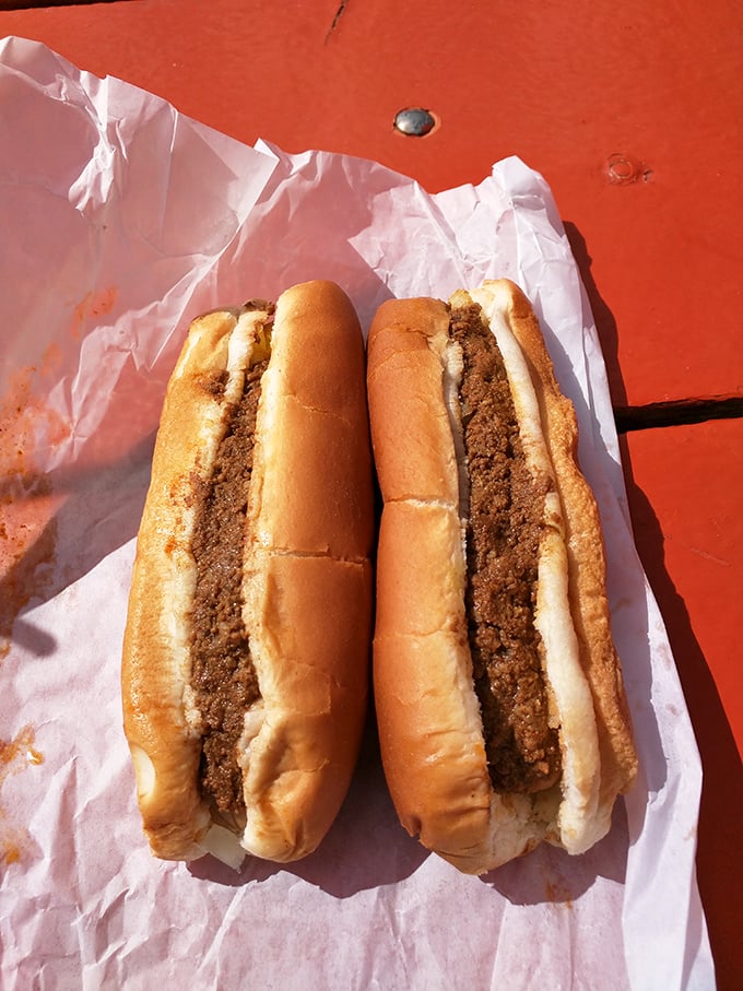 These aren't just chili dogs; they're edible nostalgia. The perfect ratio of meat to bun to chili that makes you wonder why you'd eat anything else.