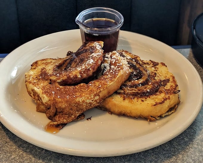 This isn't just French toast—it's a cinnamon-kissed masterpiece that makes ordinary breakfast seem like a sad compromise. Maple syrup perfection!