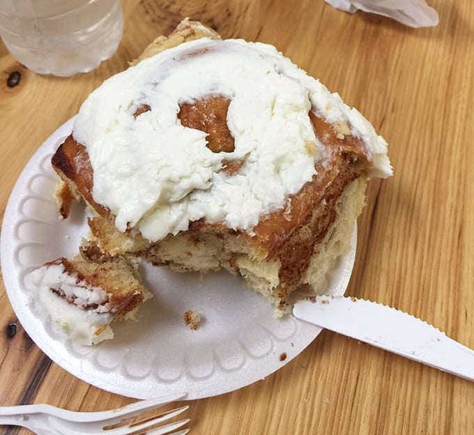 This isn't just a cinnamon roll—it's edible architecture, a spiral of joy crowned with frosting that makes Monday mornings bearable again.