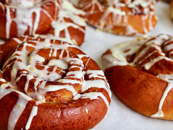 These aren't just cinnamon rolls—they're spiral-shaped happiness with icing that doesn't apologize for its generosity.