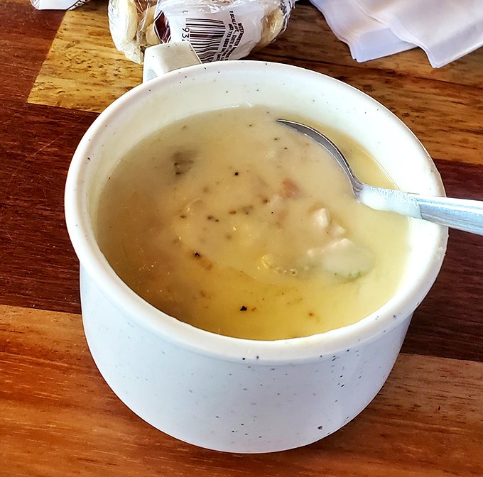 This isn't just clam chowder—it's a creamy ocean hug in a bowl, with tender clams playing hide-and-seek among potatoes and herbs.