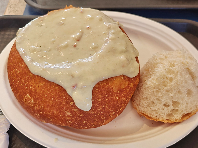 This isn't just clam chowder; it's a creamy ocean symphony in a sourdough concert hall. The way that broth cascades over the bread bowl should be illegal.