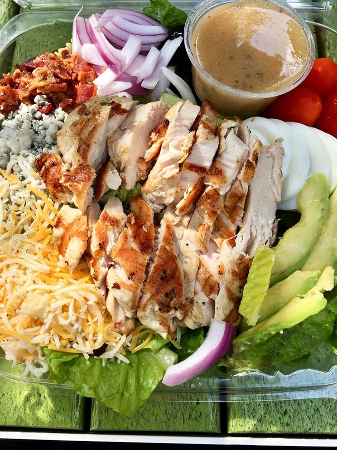 Not just any Cobb salad – this is the Sistine Chapel of salads, where every ingredient stands at perfect attention, waiting for your fork's first dive.