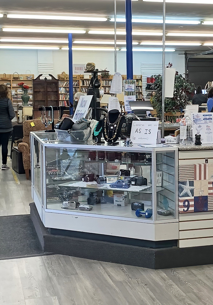 Display cases showcase the more valuable finds—vintage cameras and jewelry that whisper stories of decades past, waiting for new chapters.