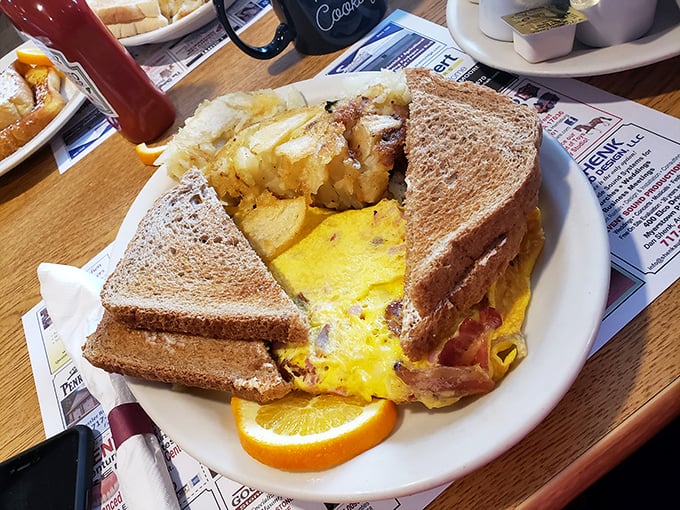 This breakfast sandwich isn't just food—it's architecture. The golden eggs and toast create a skyscraper of morning delight worth climbing.